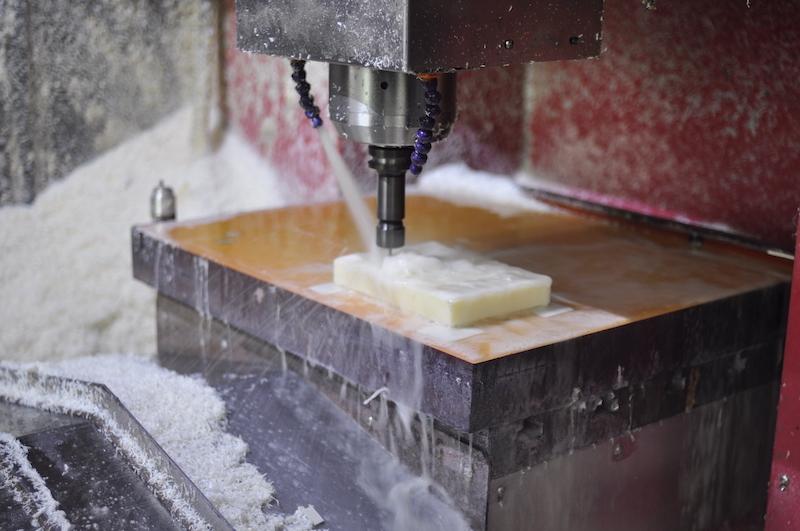 Adaptive milling strategies for varying material hardness